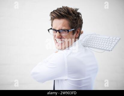 Man, angry and hitting with keyboard, boss and portrait to employee for ...