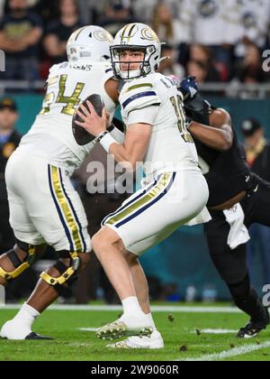 Georgia Tech quarterback Haynes King hands off to running back Trey ...