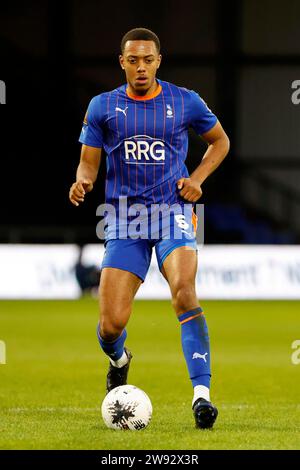 Shaun Hobson of Oldham Athletic Association Football Club is tussling ...