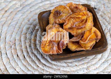 oriental dried fruits unwashed and unpeeled, dried peach before washing ...