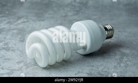 Spiral shaped bulbs on a gray background with concrete texture Stock ...