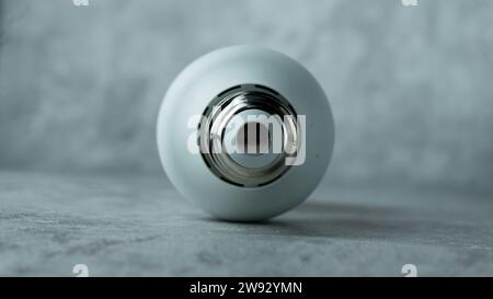 Spiral shaped bulbs on a gray background with concrete texture Stock ...