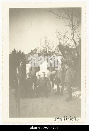 Wehrmacht soldiers with a snowman. Seven Wehrmacht soldiers have made a ...