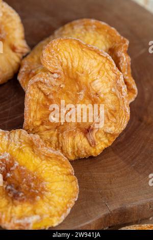 oriental dried fruits unwashed and unpeeled, dried peach before washing ...