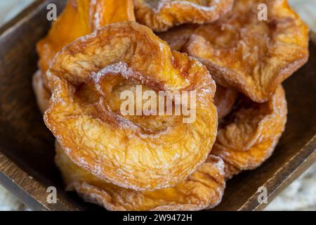 oriental dried fruits unwashed and unpeeled, dried peach before washing ...