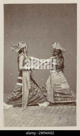 Studio Portrait of two Javanese dancers in traditional clothing and ...