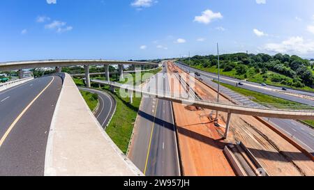 Driving road highway overhead ramps through construction expansion ...
