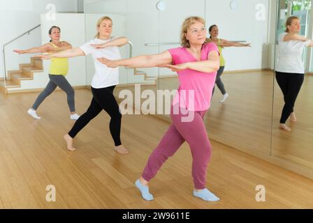 Mature women dancing aerobics at lesson in dance class Stock Photo - Alamy