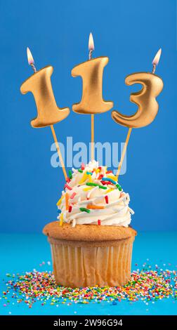 Candle number 113 - Cake birthday in orange background Stock Photo - Alamy