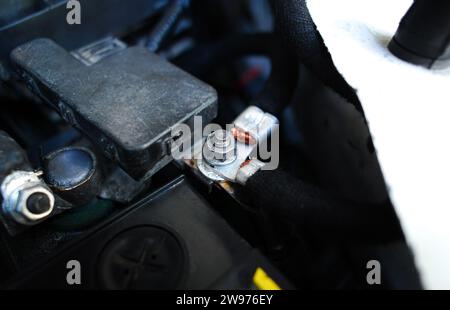 Ground wire or negative electrode on car chassis in engine compartment ...