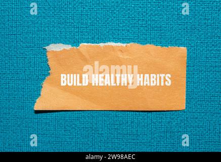 Build healthy habits lettering on ripped paper. Conceptual photo Stock ...
