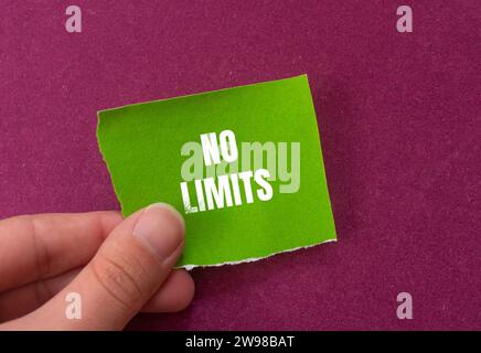 No limits lettering on ripped paper Stock Photo - Alamy