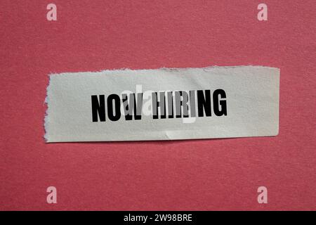 Now hiring lettering on ripped paper. Business recruitment concept ...