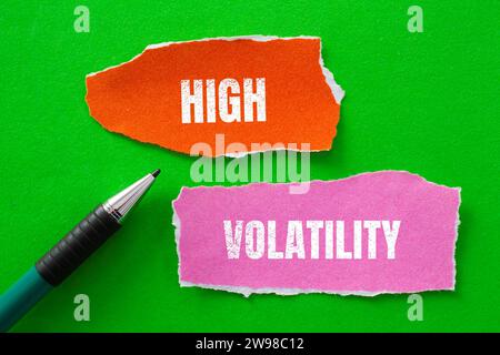 High volatility lettering on ripped paper. Business concept Stock Photo ...