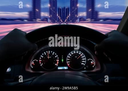 Driving at a speed of 180 km / h on the highway, against the background ...