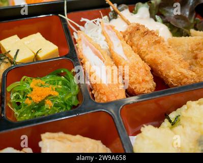 bento box with sushi, tempura and salad Stock Photo - Alamy