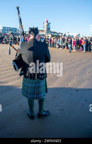 Bold Boxing Day dippers brave the icy waters of North Sea during the ...