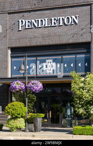Kirkland, WA, USA - June 6, 2023; Vertical sign for King County Library ...