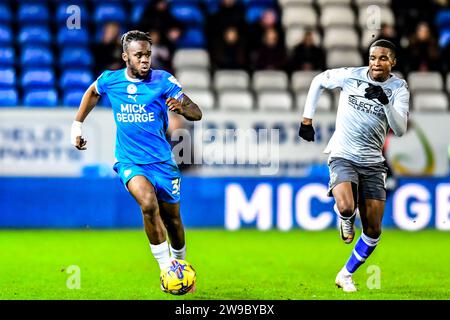 Peter Kioso (30 Peterborough United) challenges Caylan Vickers (12 ...