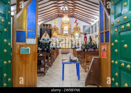 A sermon service inside Virgen del Carmen church at Aguas Calientes ...