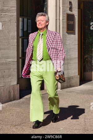 Clueless Poorly Dressed Man Striding down a New York City street with ...