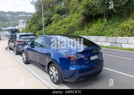 Blue Tesla Model Y parked in Palm Beach,Sydney,Australia in December ...