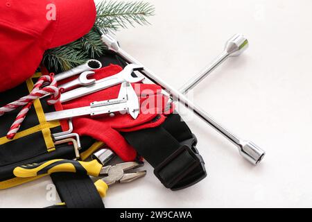 Technician's tools with Christmas decor on white background Stock Photo ...