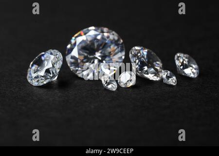 Many beautiful shiny diamonds on dark background Stock Photo - Alamy