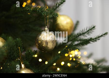 Closeup of Christmas balls hanging indoors Stock Photo - Alamy