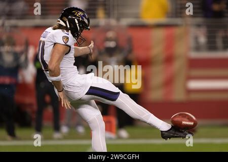 Baltimore Ravens punter Jordan Stout (11) greets place kicker Tyler ...