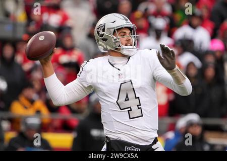 Las Vegas Raiders quarterback Aidan O'Connell (12) rolls out against ...