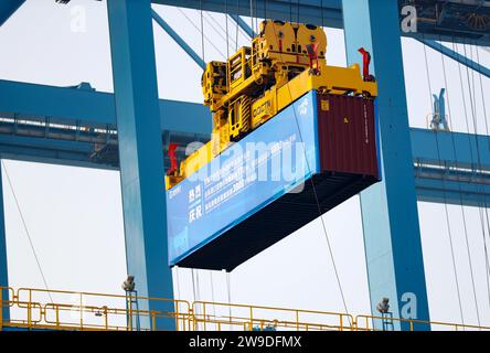 Automated guided vehicles transport cargo at the fully automated ...