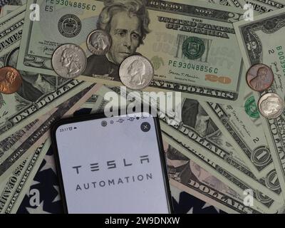 In this photo illustration, a Tesla Automation GmbH logo seen displayed ...