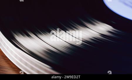 Hypnotic spin of vinyl disc. Timeless cinematic charm of analog music ...