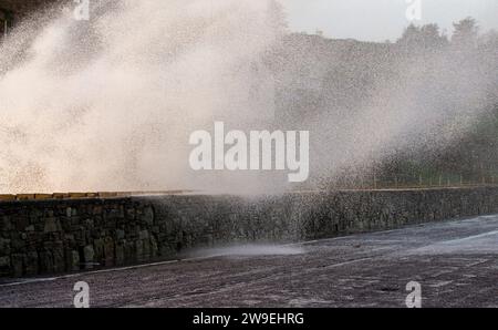 Atlantic storm waves bursting on sea defence wall Stock Photo - Alamy