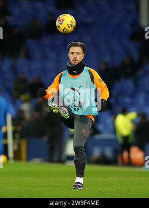 Jack Grealish of Everton warming up and gives a smile and thumbs up to ...
