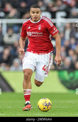 Murillo of Nottingham Forest breaks with the ball under pressure from ...