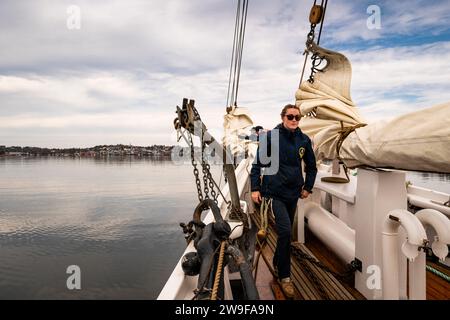 Stowing sails onboard the replica Grand Banks fishing schooner Bluenose ...