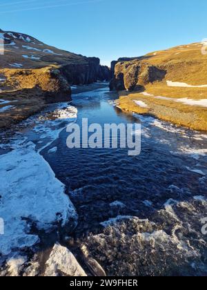 Large water flowing from hillsides and slopes in Iceland arctic Gulfoss ...