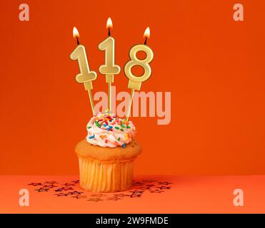 Birthday card - Number 118 candle in orange background Stock Photo - Alamy