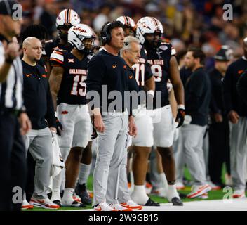 Texas A&M head coach Mike Elko watches players stretch before an NCAA ...