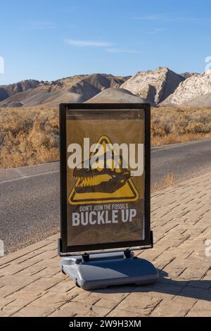 A traffic sign at the entrance to Dinosaur National Monument saying ...