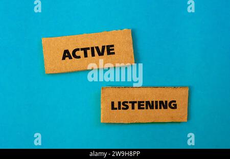 Active listening lettering on ripped paper. Top view, copy space Stock ...