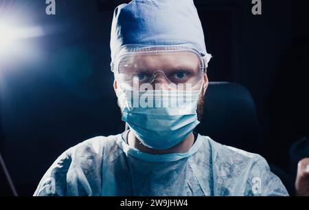 Medical laboratory assistant in personal protective equipment ...
