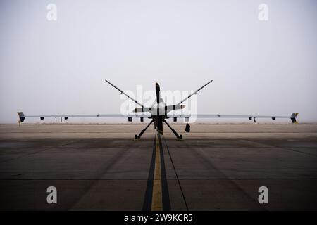An MQ-9 Reaper assigned to the 29th Attack Squadron sits on the flight ...
