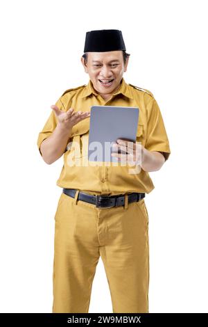 A civil servant man using a tablet isolated over a white background ...