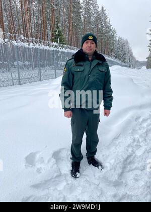 Silene, Latvia. 13th Dec, 2023. Latvian border guard Vladimirs Sersts ...