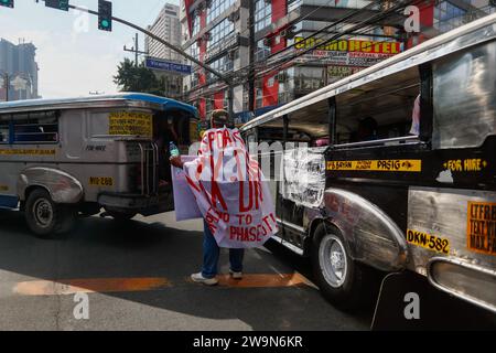 Manila, Metro Manila, The Philippines. 29th Dec, 2023. A protester with ...