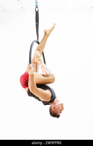 Executing dynamic and spiraling movements, he crafts an intense routine ...