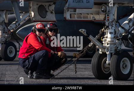 Aviation Ordnanceman 3rd Class Quentin Bryant, gives a thumbs up that ...